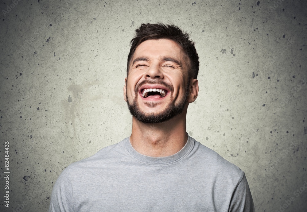 Joy. Guy laughing Stock Photo | Adobe Stock