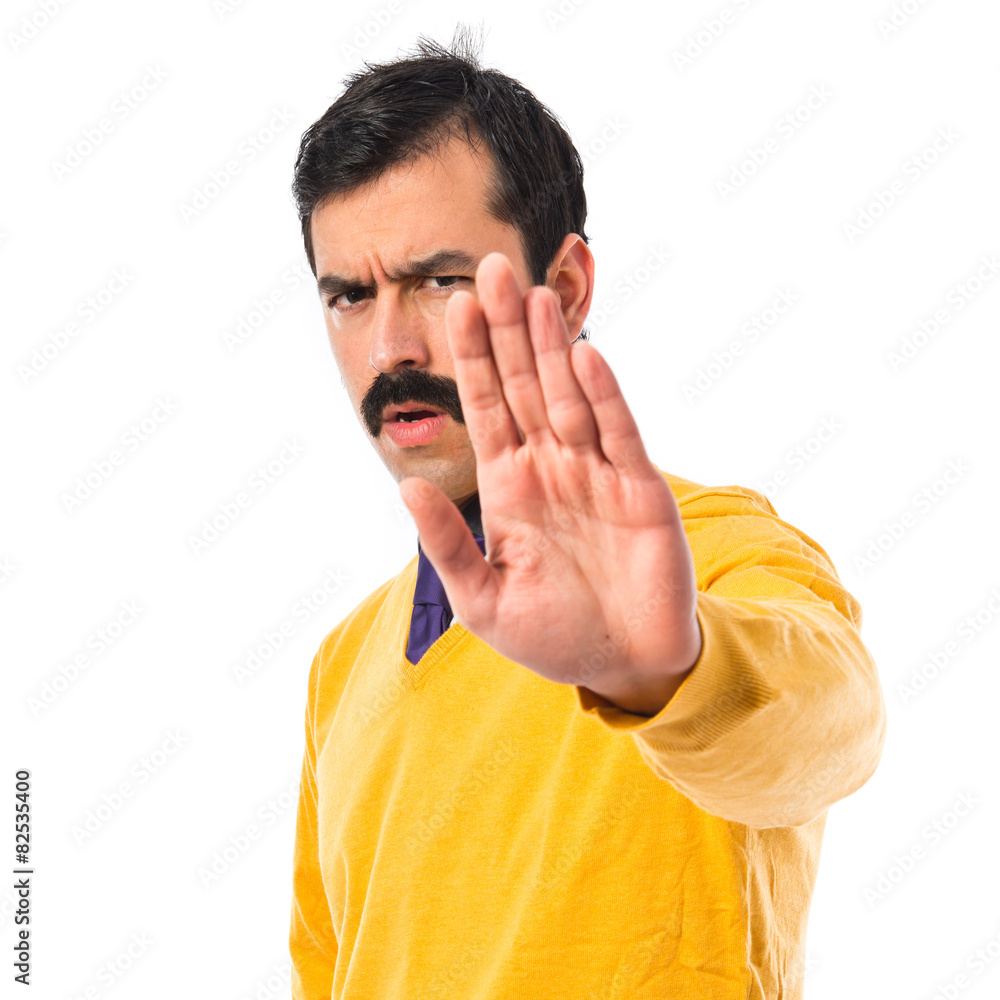 Man with moustache making stop sign Stock Photo | Adobe Stock