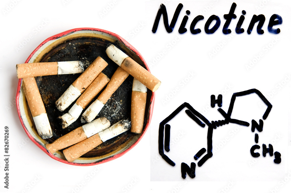 Nicotine, the chemical formula and cigarette butts Stock Photo | Adobe ...