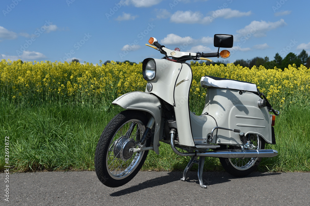 Moped Schwalbe vor Rapsfeld Stock-Foto | Adobe Stock