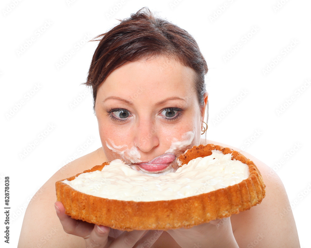 Overweight woman eating sweet cake with whipped cream. Stock Photo ...