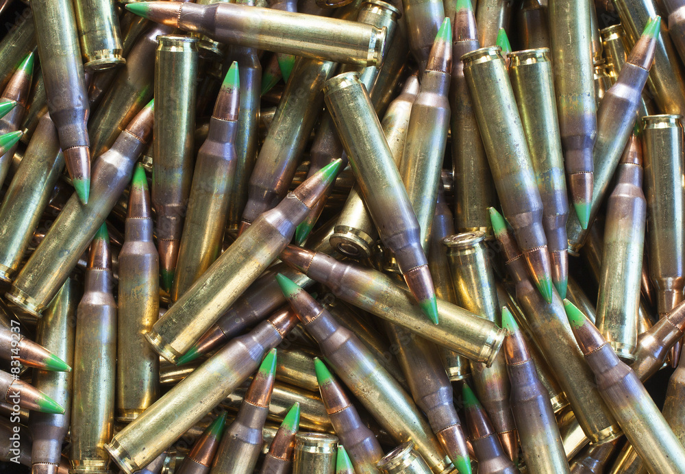 Pile of ammo with green tipped bullets Stock Photo | Adobe Stock