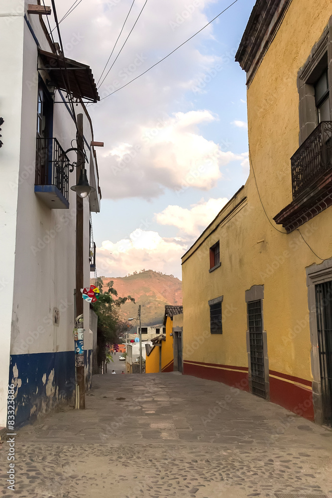 Calle peatonal con casas en pueblo mágico Stock Photo | Adobe Stock