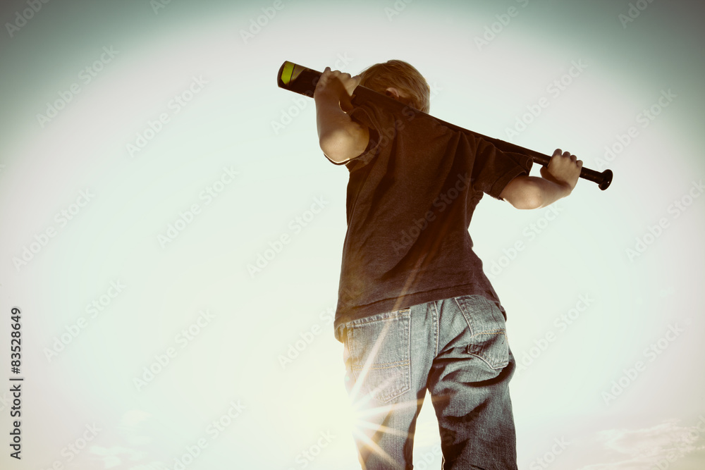 USA, Colorado, Young boy (6-7) with baseball bat over shoulders Stock ...