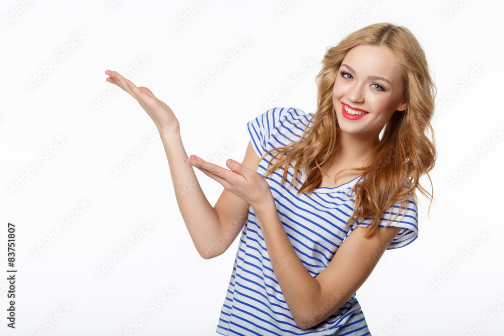 Smiling young slim tanned female showing open hand palm with cop Stock ...