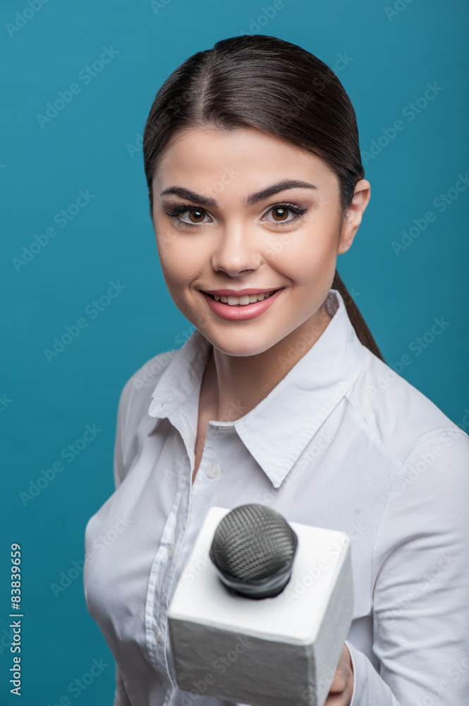 Beautiful girl TV journalist with pretty smile is reporting Stock-Foto ...