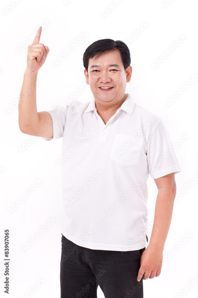 middle aged asian man pointing up to blank space Stock Photo | Adobe Stock