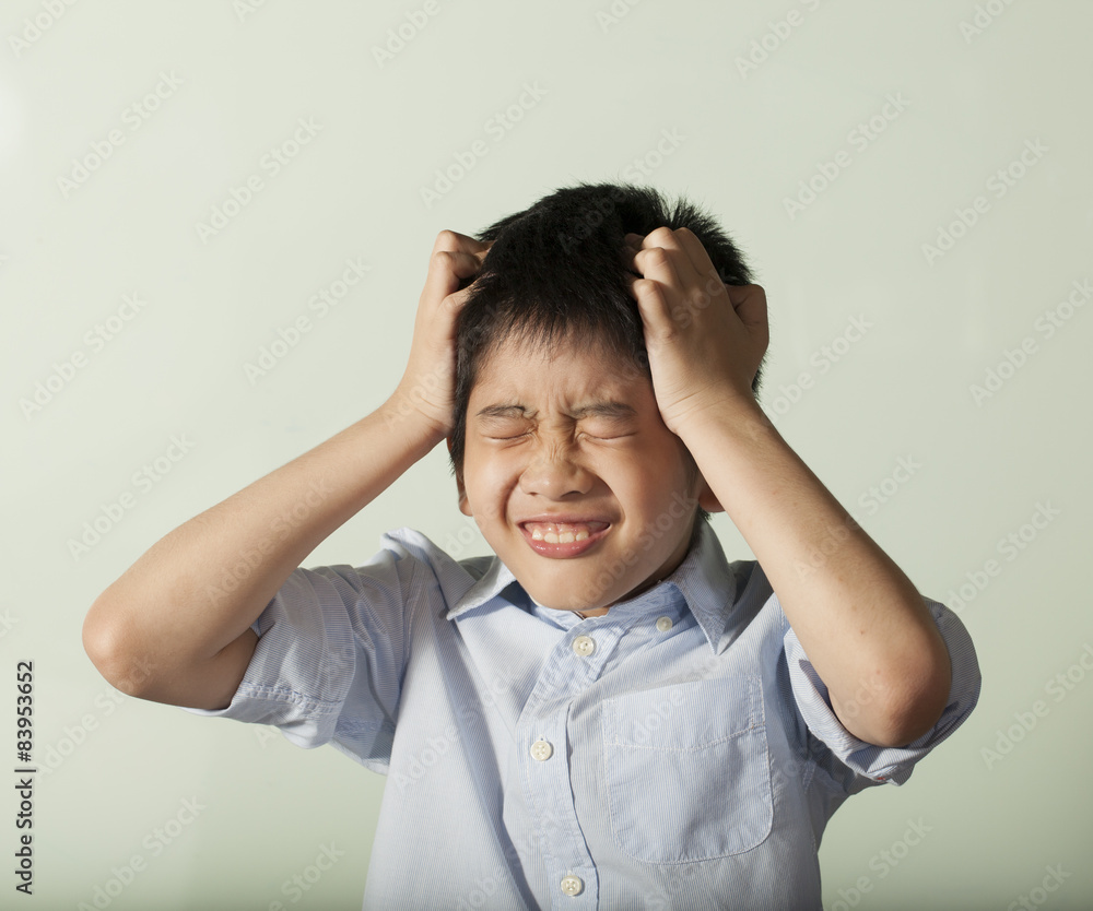 Asian young boy squeeze his head for homework like crazy Stock Photo ...