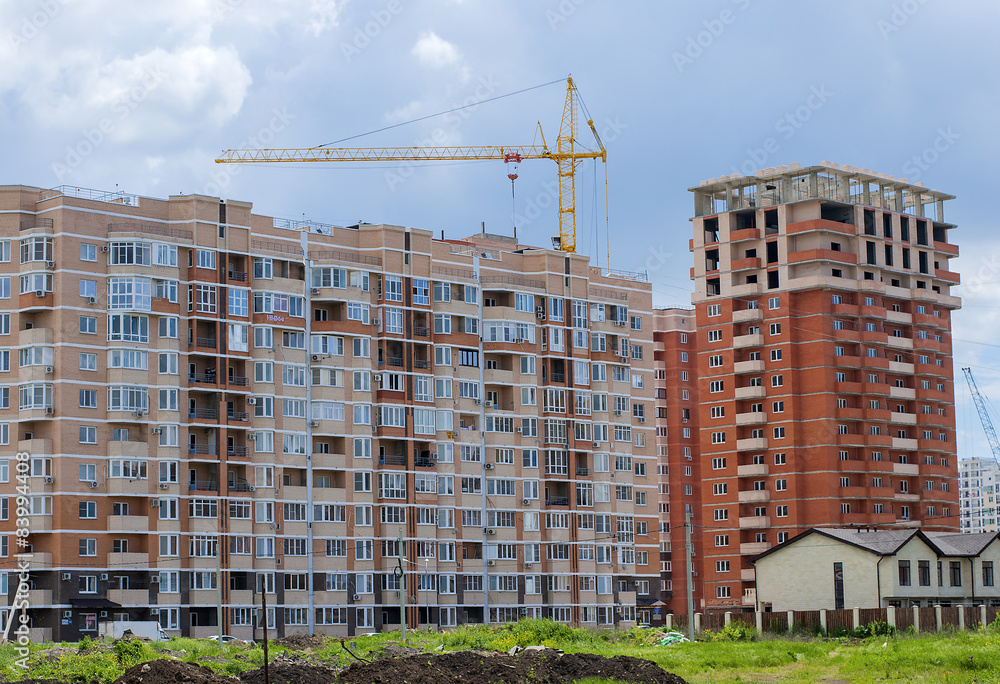 complex of residential high-rise and single-storey houses Stock Photo ...