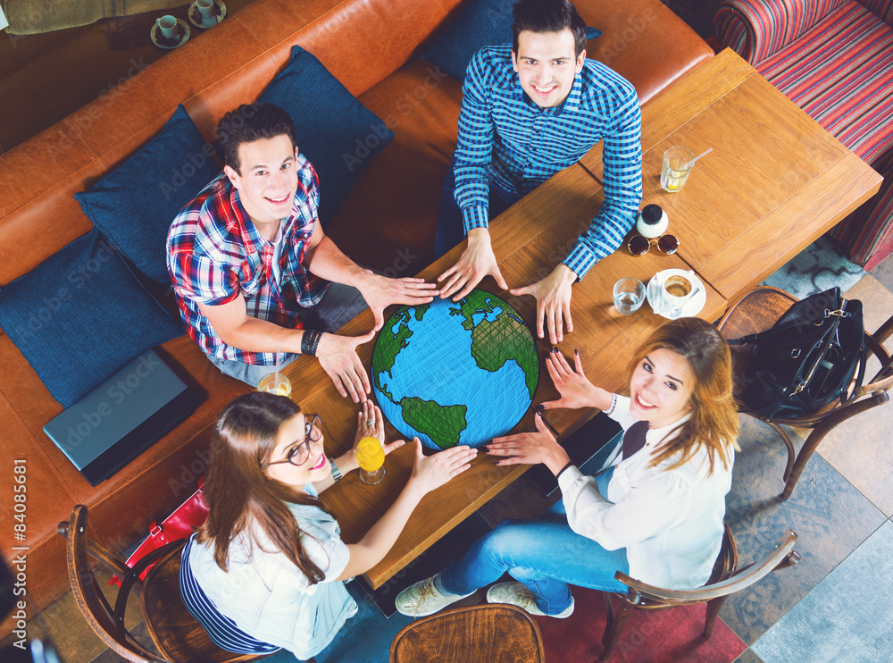 Group of young people with a drawing of a planet Earth Stock Photo ...