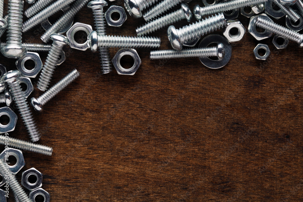 Nuts and bolts background Stock Photo | Adobe Stock