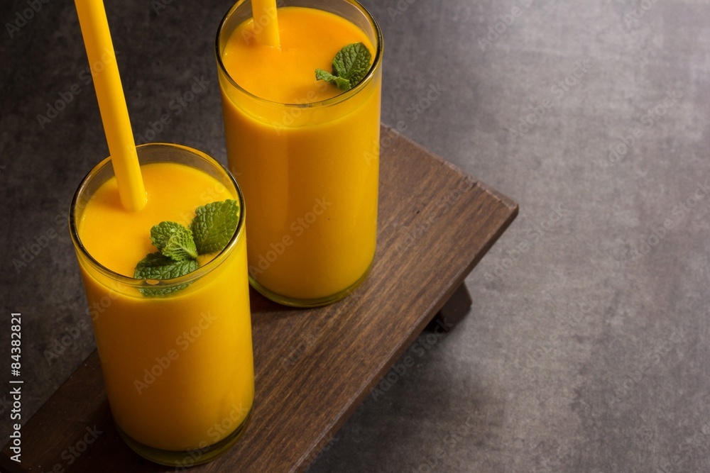 Mango lassi on beautiful grey background with copy space Stock Photo ...