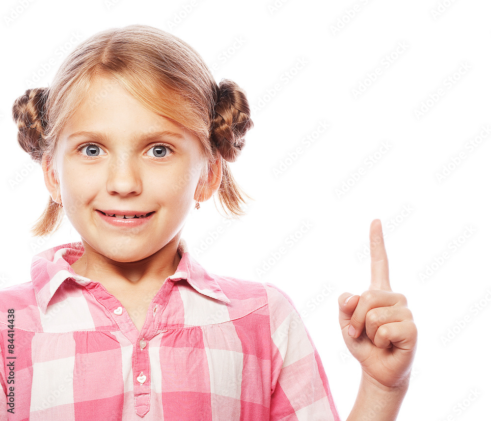 Pretty school girl pointing her index finger Stock Photo | Adobe Stock