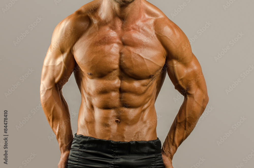 Strong bodybuilder with six pack.Strong bodybuilder man with perfect ...