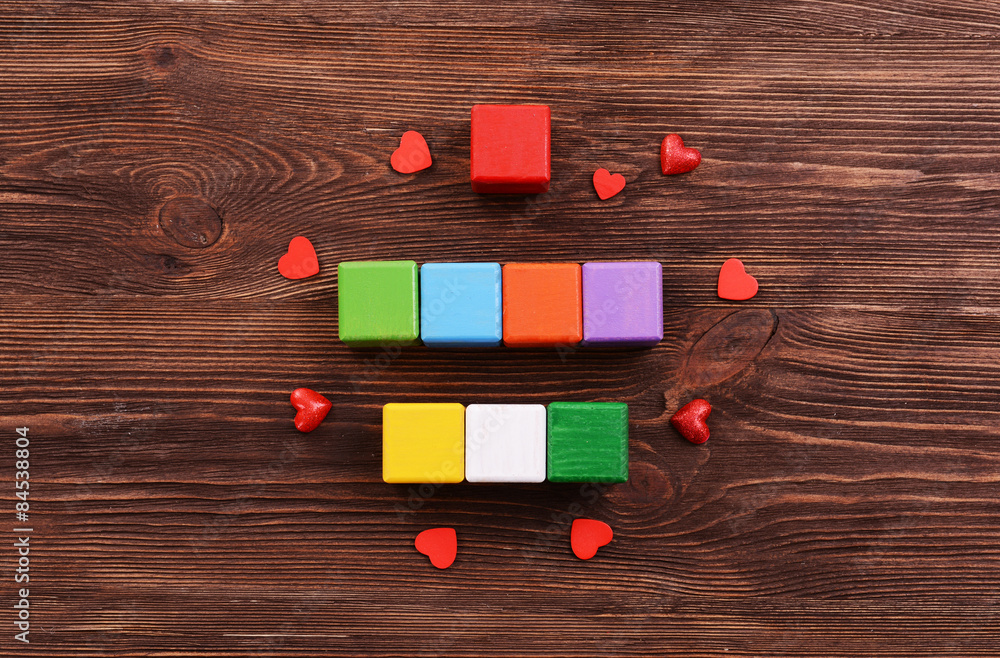 Colorful cubes for inscriptions on wooden background Stock Photo ...