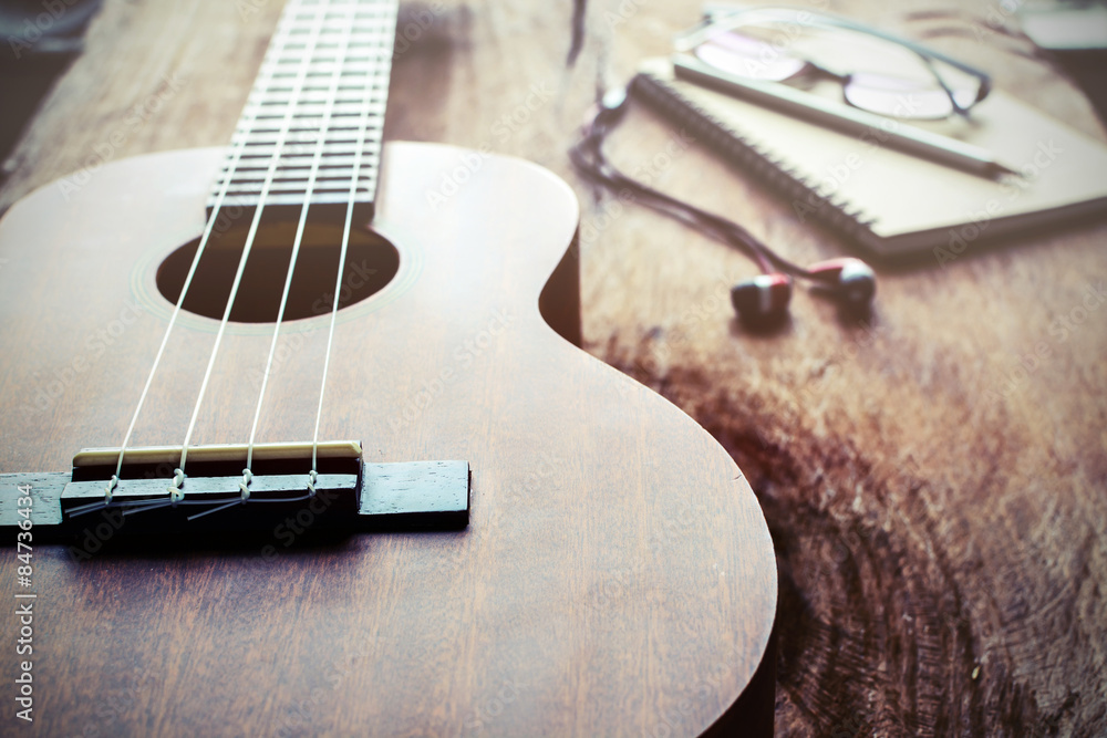 Close up of ukulele on old wood background with soft light Stock Photo ...