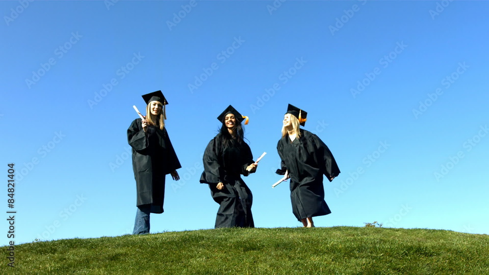 Three graduates jumping and celebrating Stock Video | Adobe Stock
