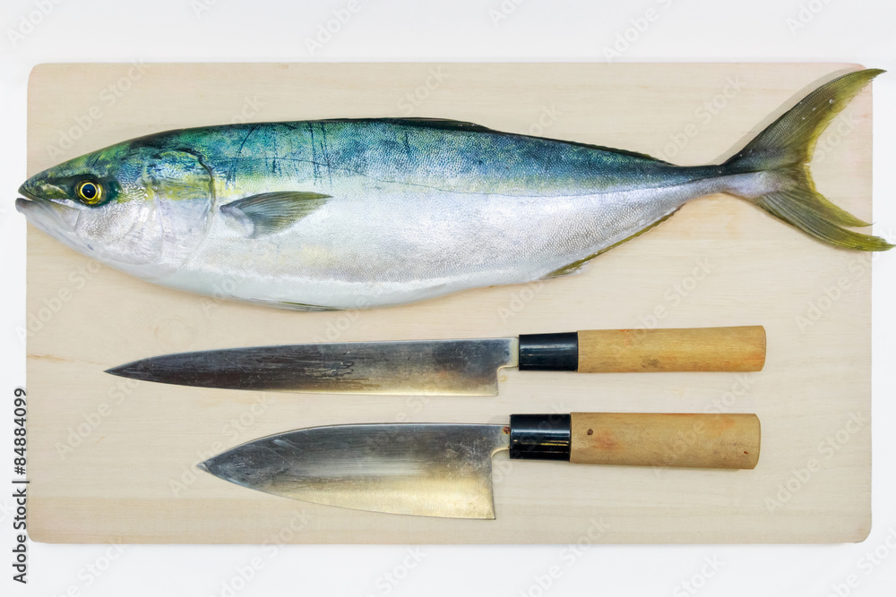 Preparing a Japanese yellowtail in the Japanese style Stock Photo ...