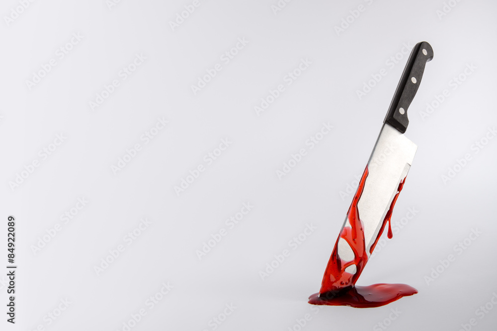 Kitchen knife dripping in blood with copy space Stock Photo | Adobe Stock