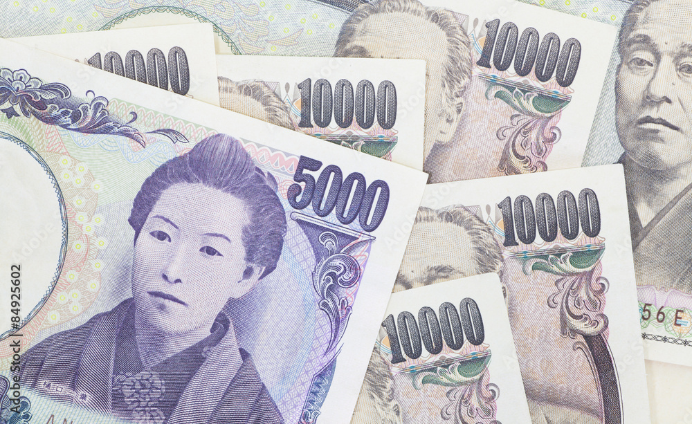 Stack of japanese currency yen or Japanese banknotes Stock Photo ...