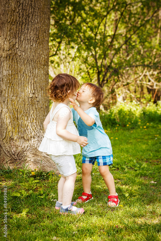 Two Little Kids Kissing