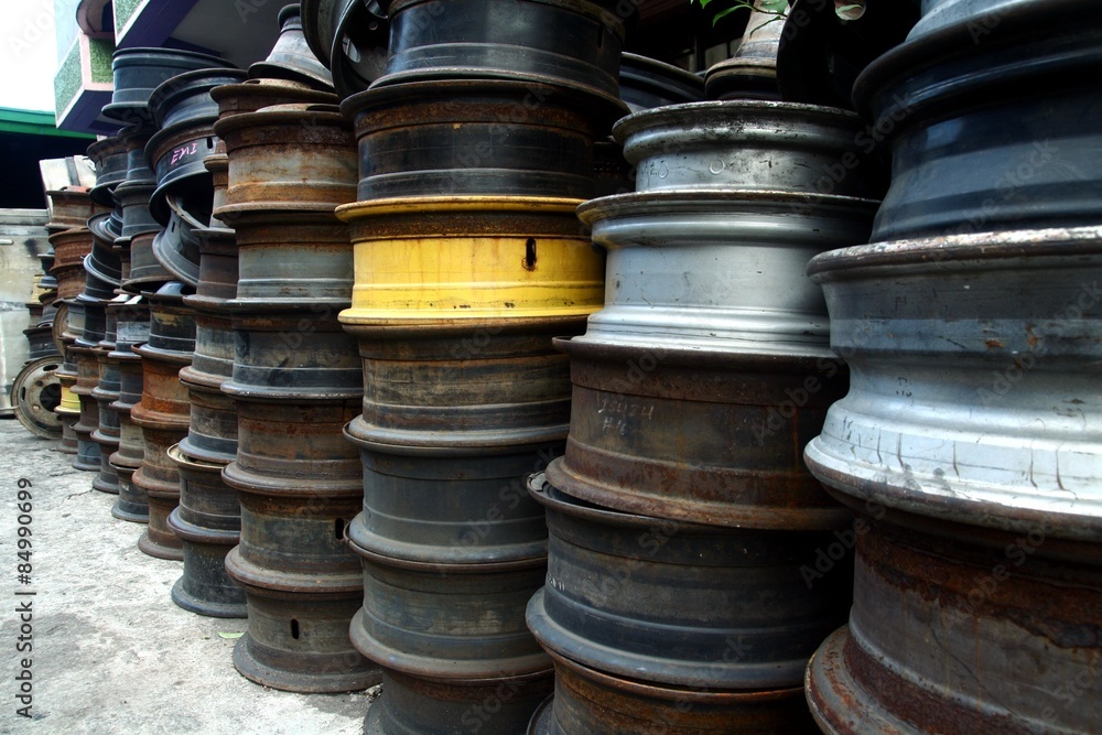 Used and surplus tire rims Stock Photo | Adobe Stock