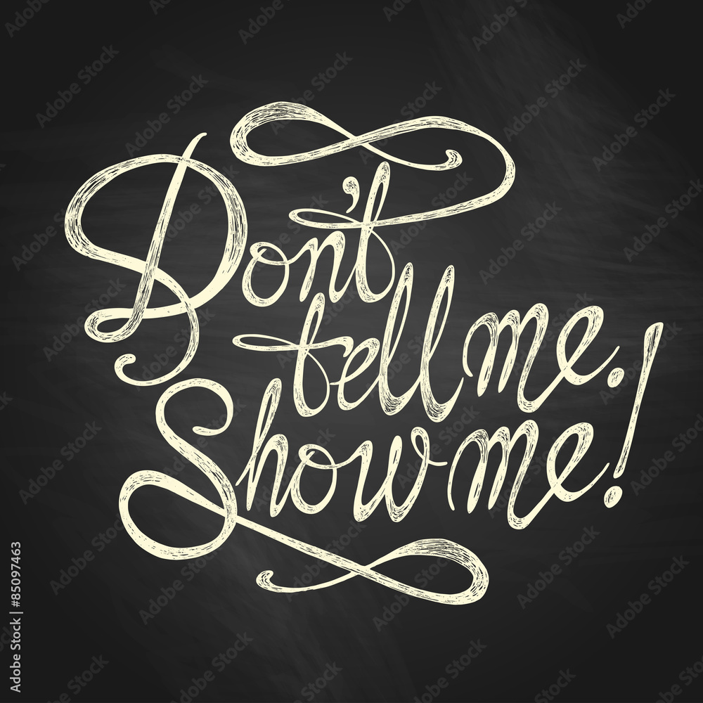 Don't Tell Me, Show Me - hand drawn quote, white on the blackboard ...