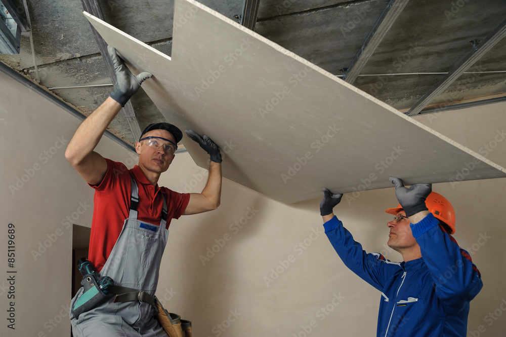 Drywall Installers foto de Stock | Adobe Stock