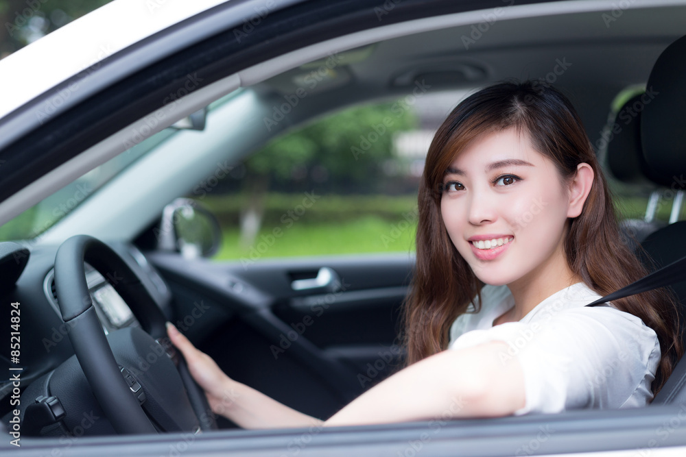 Beautiful young asian woman driving car Stock Photo | Adobe Stock