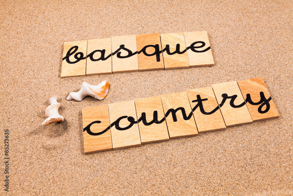 Words formed from small pieces of wood containing a sun and beach ...