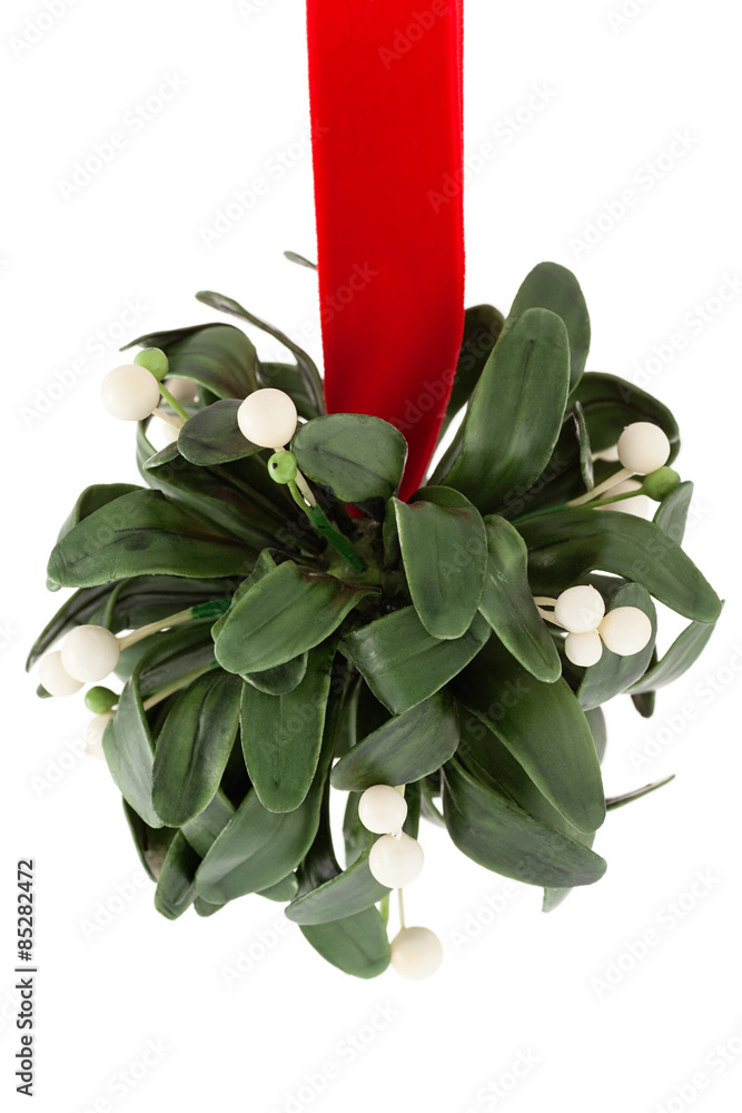 Christmas Mistletoe hanging with red velvet ribbon on white background ...