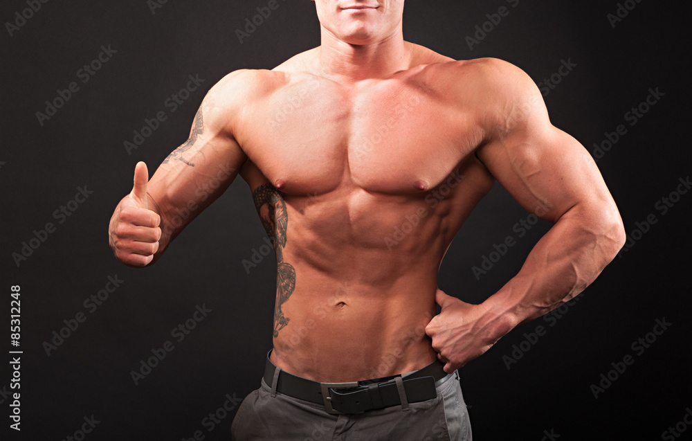 strong man showing thumbs up Stock Photo | Adobe Stock