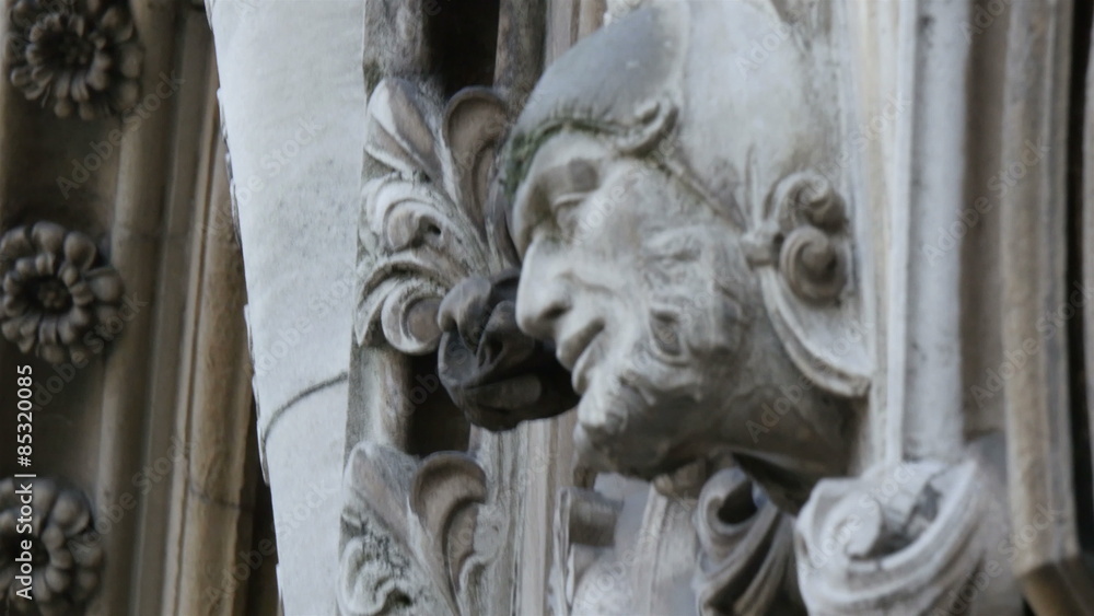 An image of the faces sculpted on the wall of Westminster Abbey Well ...