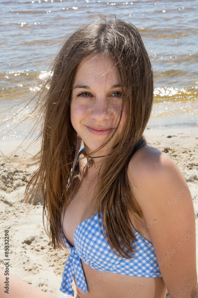 Teenager Girl In Blue Swimming Suit On The Beach Stock Photo Adobe Stock