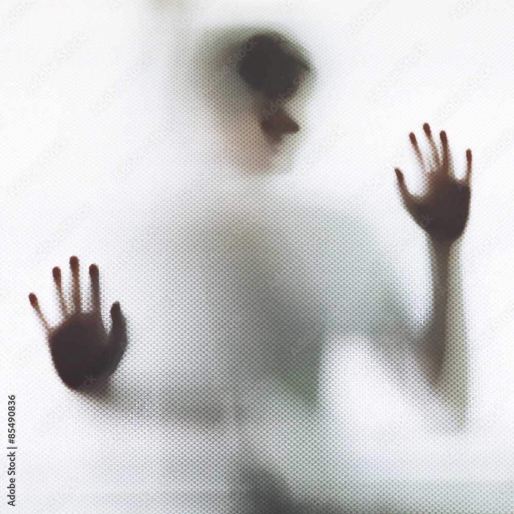 Man standing at the mirror wall Stock Photo | Adobe Stock