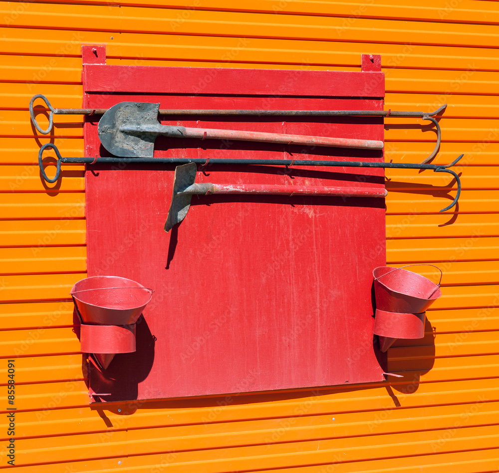 Firefighter shield with fire extinguishing tools Stock Photo | Adobe Stock