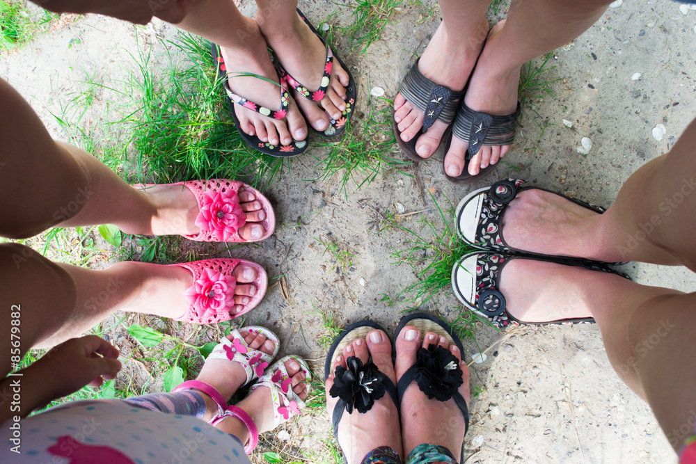 Group of girls standing in a circle on a spring meadow Stock Photo ...