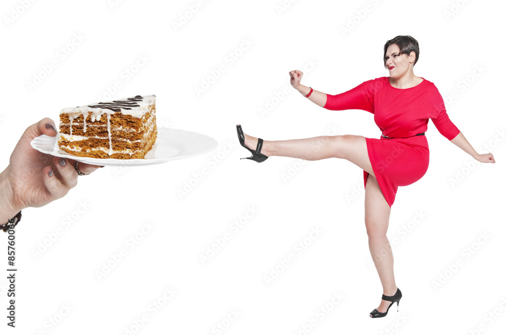 Beautiful plus size woman fighting off unhealthy food isolated Stock ...