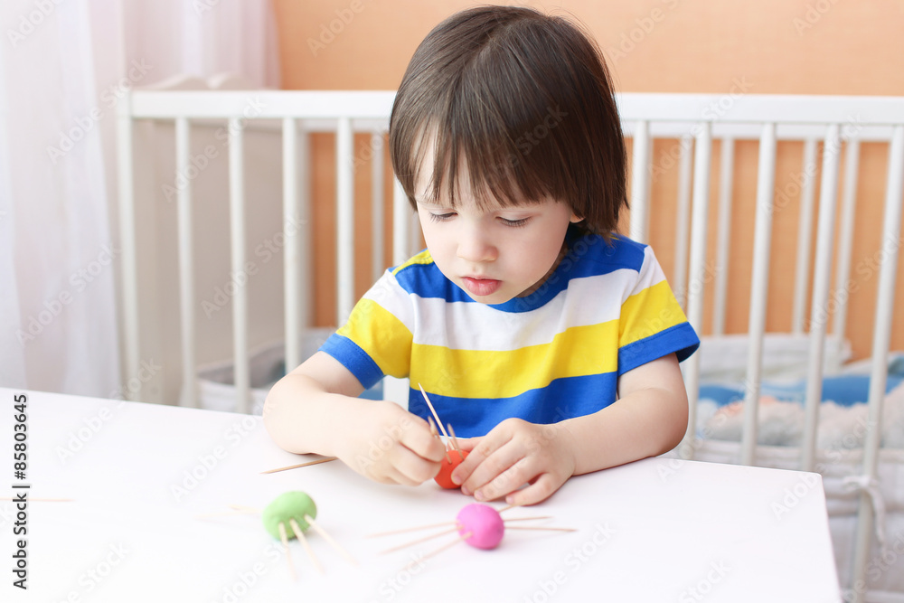 Lovely little boy made toothpick legs by playdough spiders Stock Photo ...