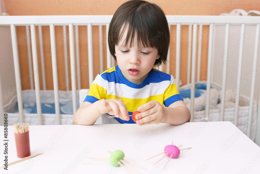Cute little child made toothpick legs by playdough spiders Stock Photo ...