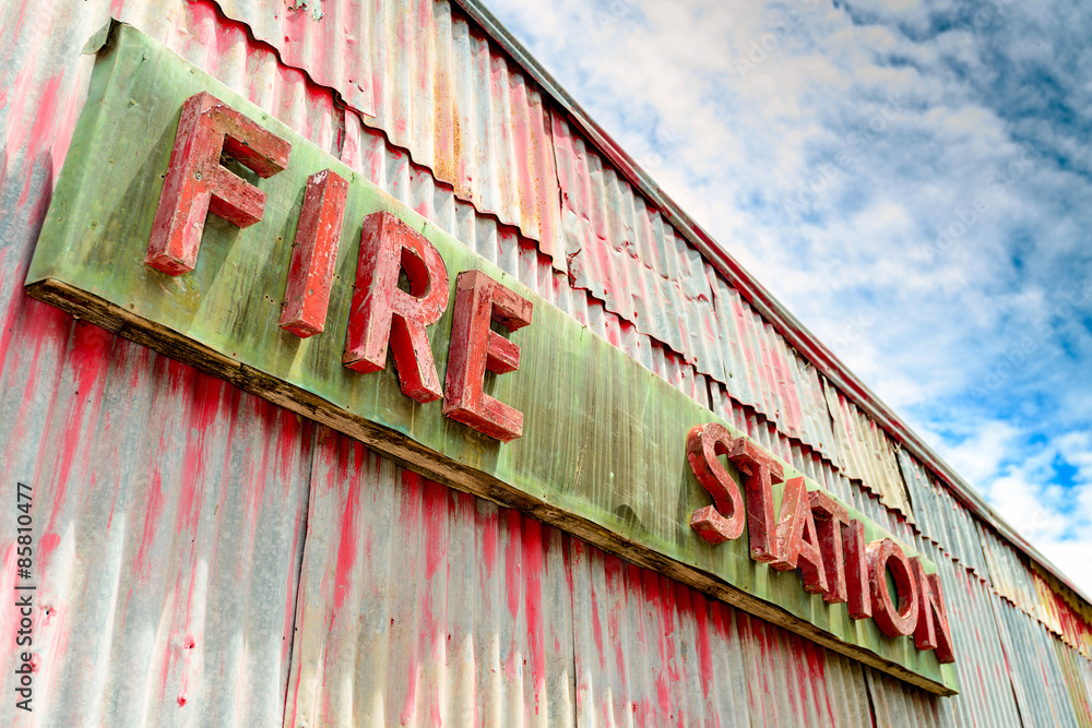 Fire station banner hanging on the metal wall Stock Photo | Adobe Stock