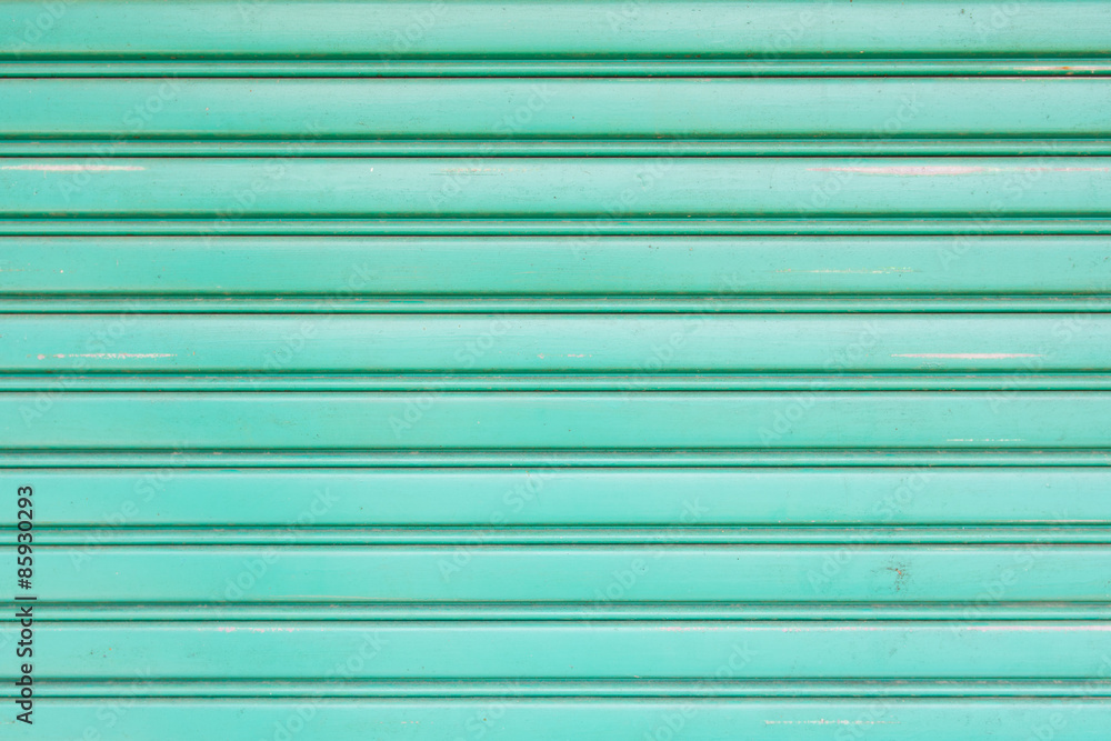 green metallic roller shutter door for wallpaper Stock Photo | Adobe Stock