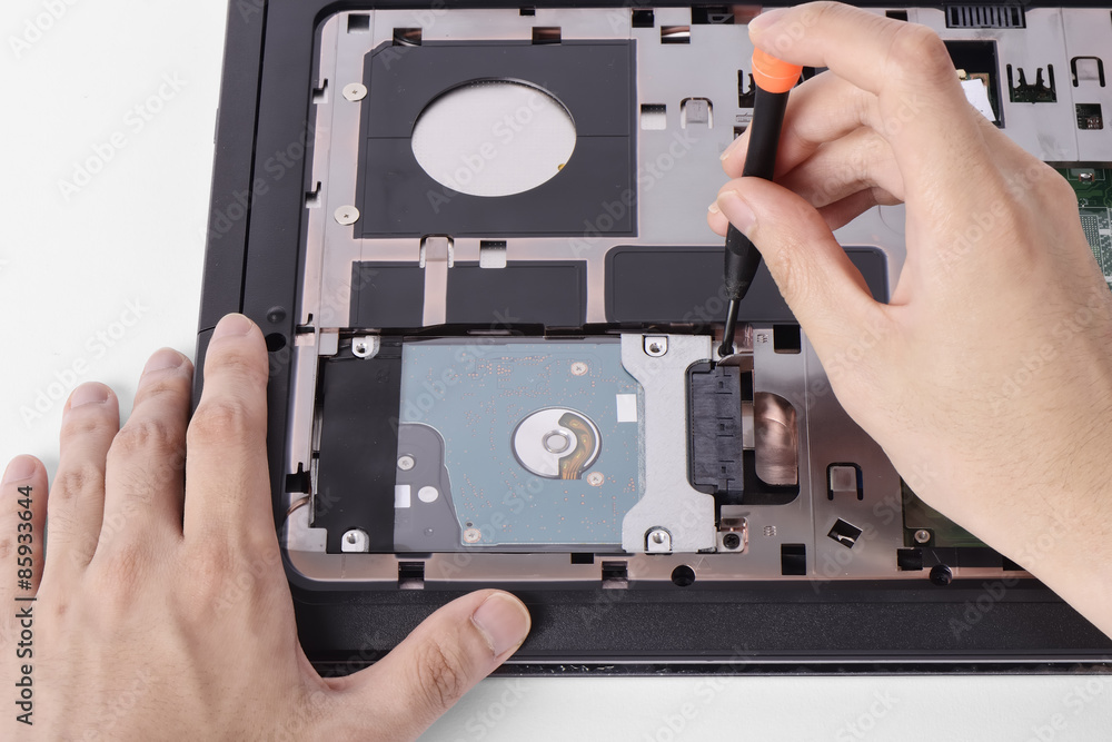 replacing a laptop hard disk drive Stock Photo | Adobe Stock