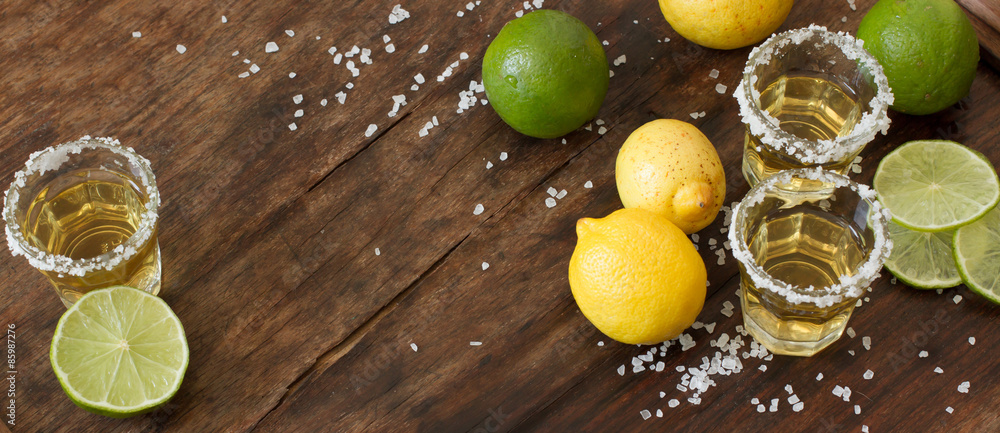 tequila lime and lemon on a wooden table Stock Photo | Adobe Stock