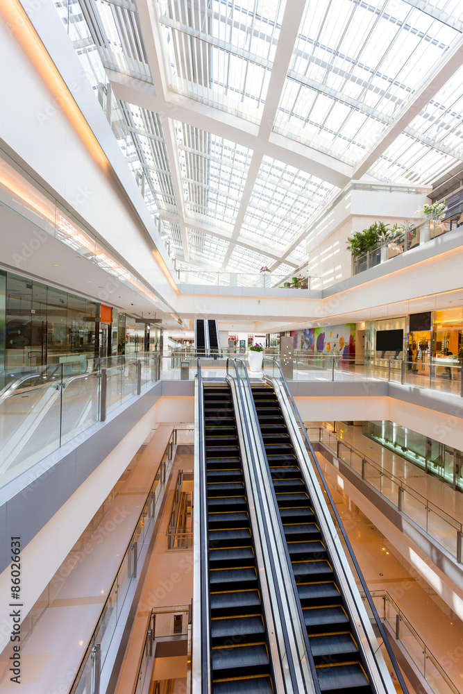 Escalator in modern shopping mall Stock Photo | Adobe Stock