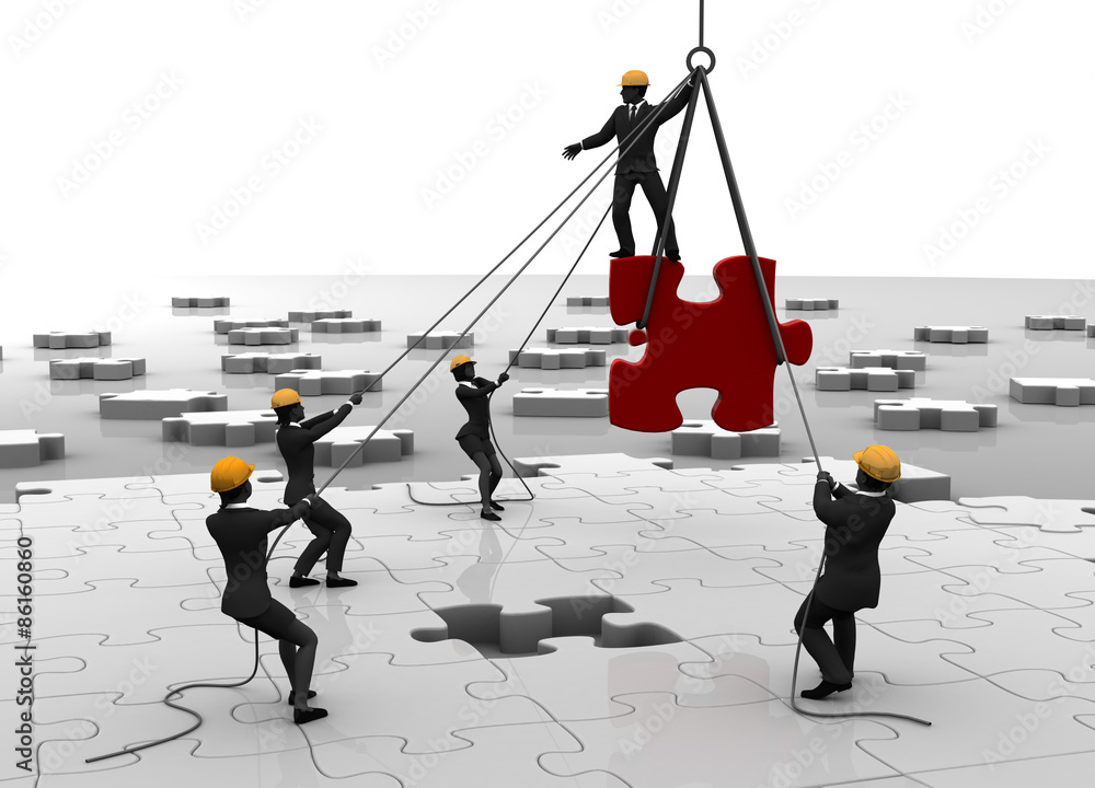 Jigsaw puzzle being built by teamwork. A great jigsaw puzzle being ...