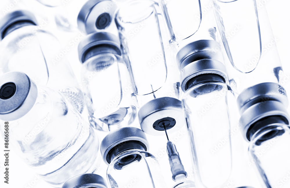 Vials and Syringe Stock Photo | Adobe Stock