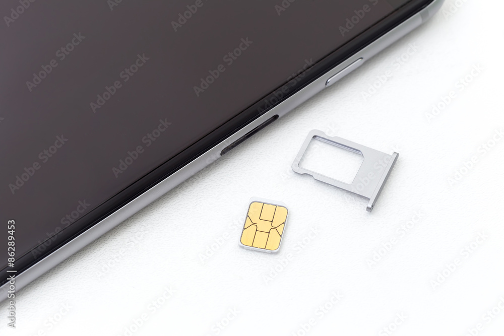 Sim card and sim card tray put nearly cell phone on white backgr Stock ...