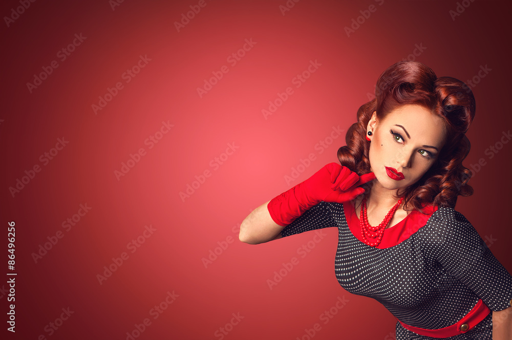 Red hair beautiful curious pin-up girl on a red background space board ...
