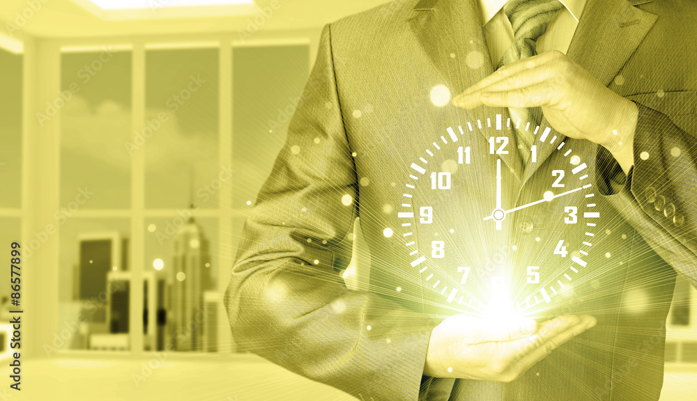 Image of businessman holding clock against illustration Stock Photo ...